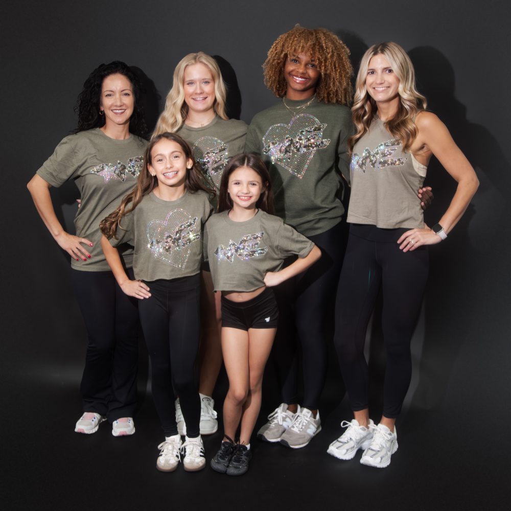 Gold/Black Bling Camo Logo on Green - Woodlands Elite Cheer Co.